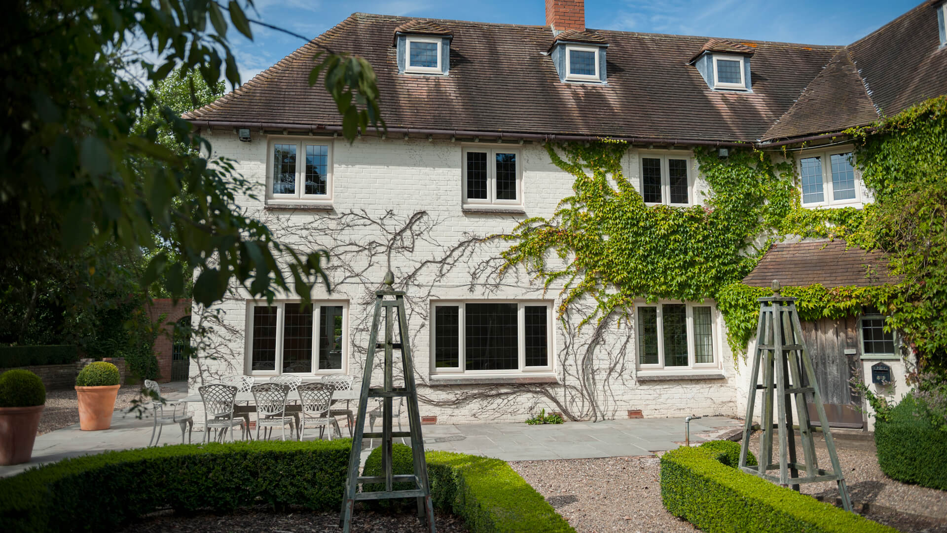 Cream Leaded UPVC Windows & Cream French Doors from James Oliver