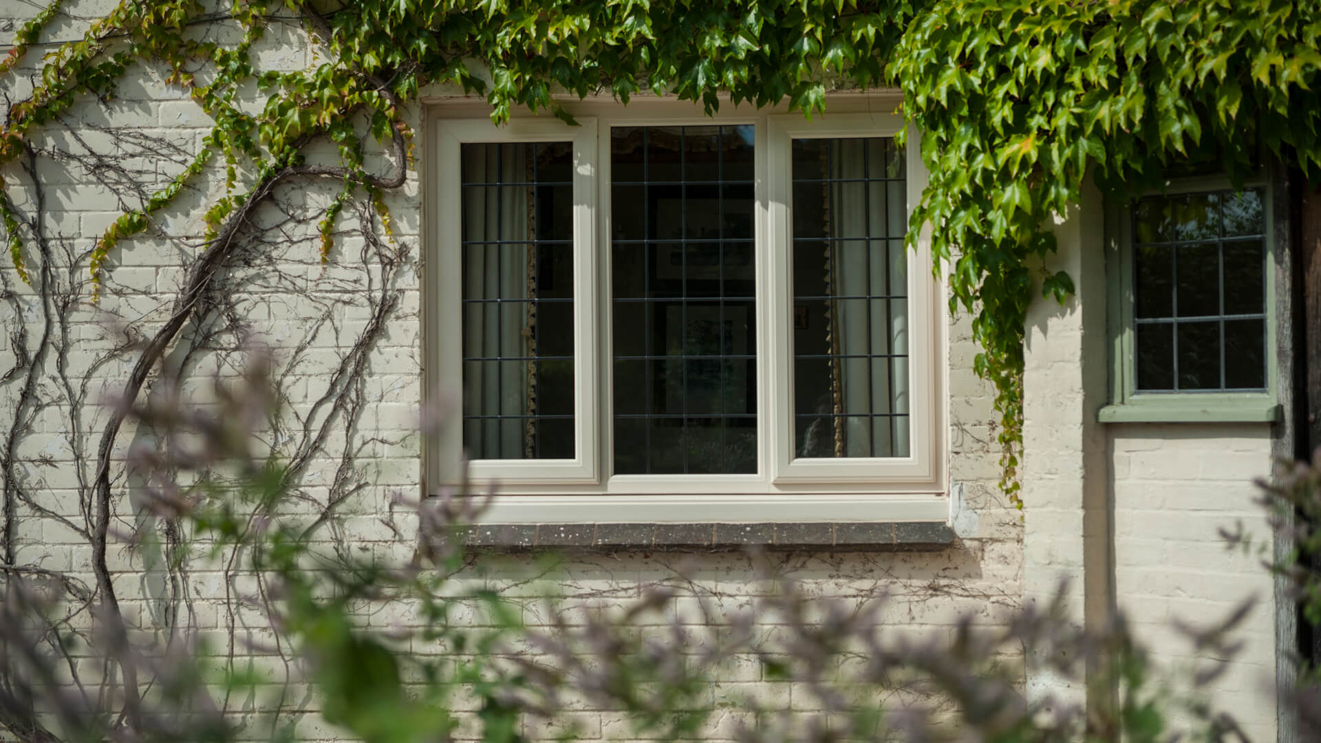 Cream Leaded UPVC Windows & Cream French Doors from James Oliver