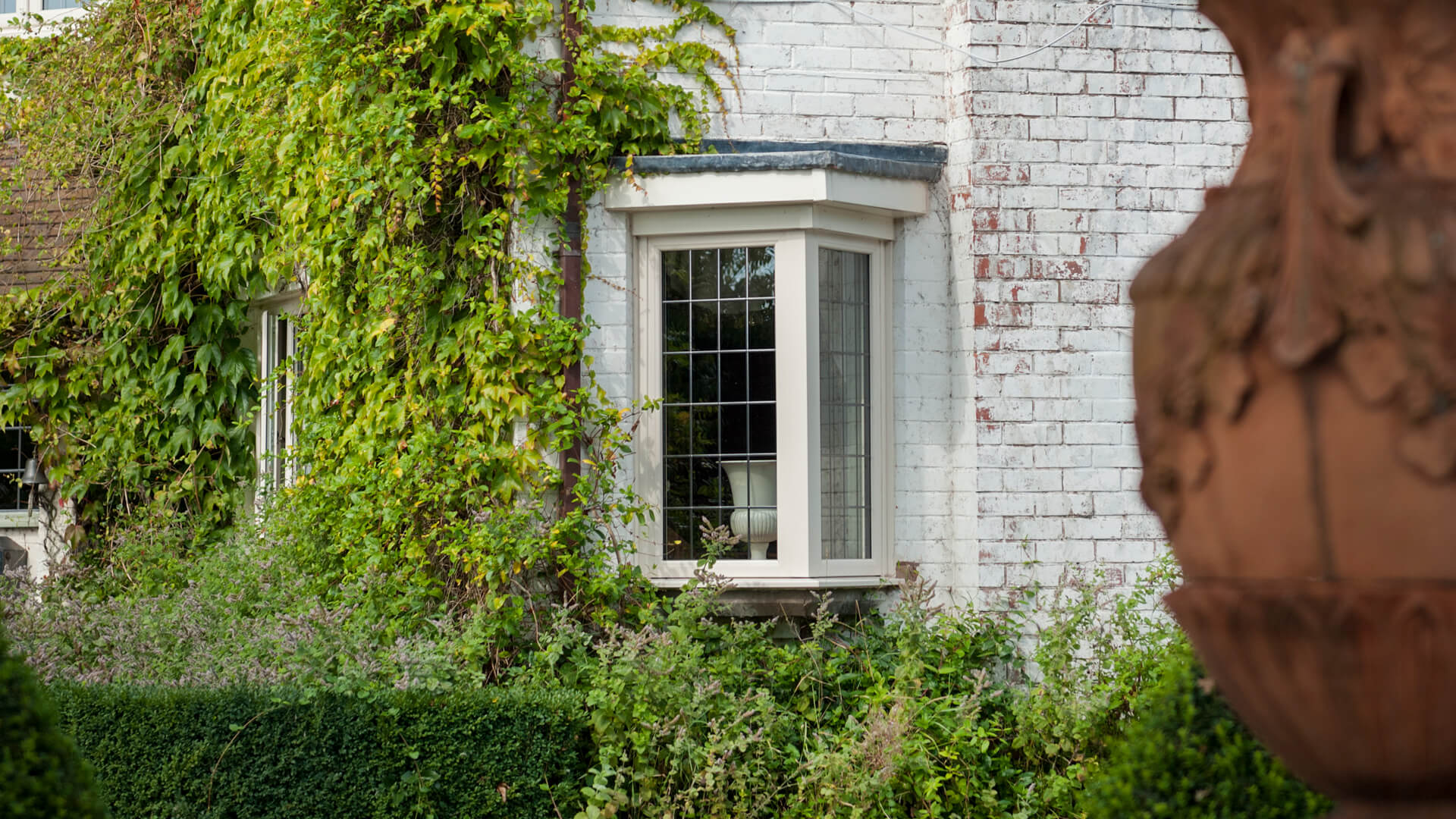 Cream Leaded UPVC Windows & Cream French Doors from James Oliver